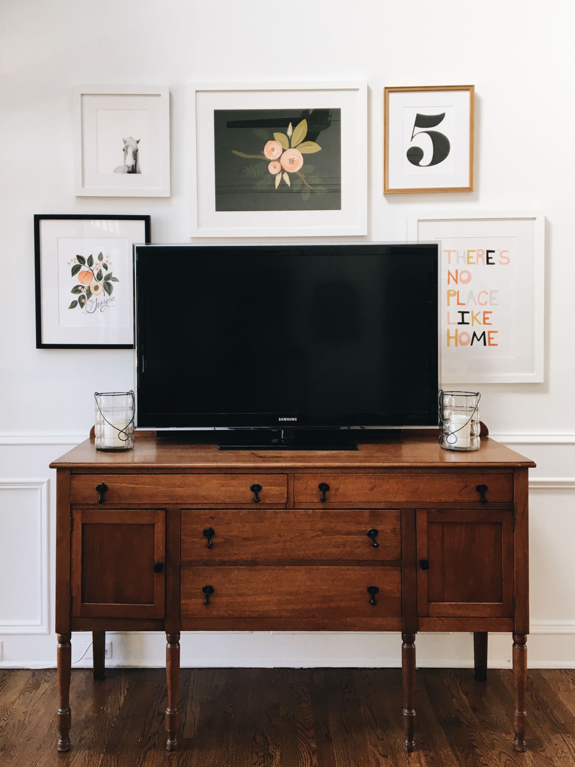 10 Ways to Make Your TV Hidden within your Decor - She Holds Dearly